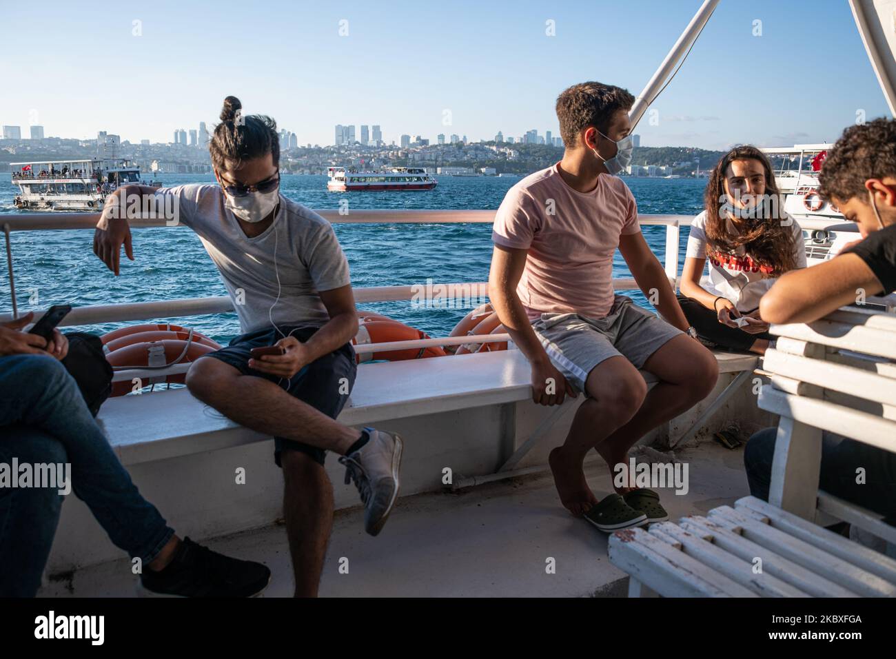 Bosphorus wear face masks hi-res stock photography and images - Alamy