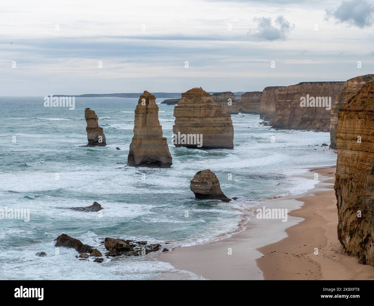 A Scenic view of The Twelve Apostles in a shoreline Stock Photo - Alamy