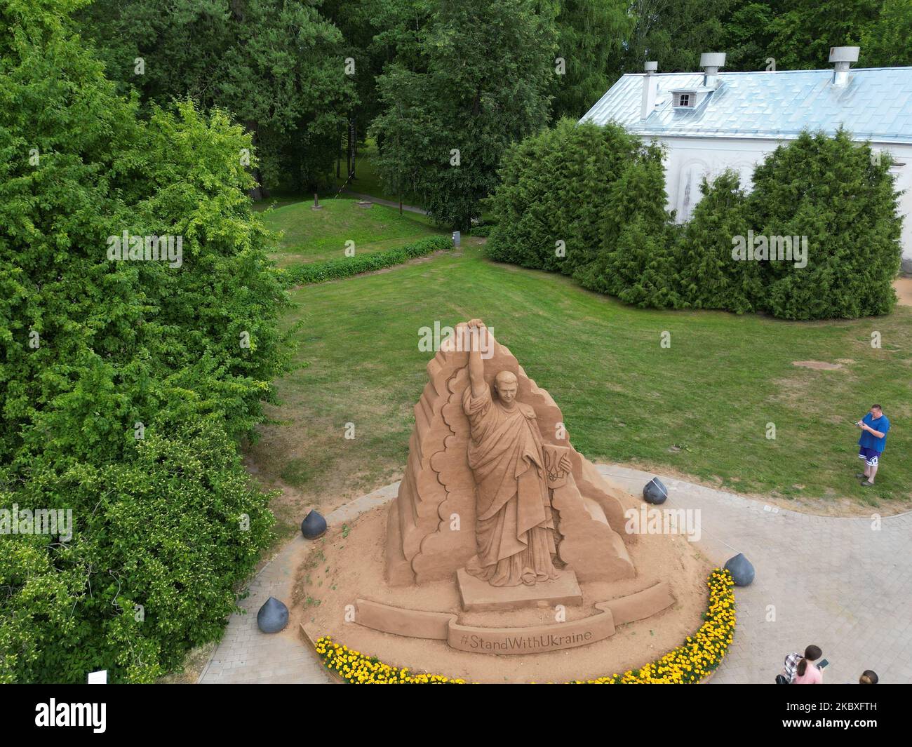 An aerial shot of a sand sculpture of a Ukrainian leader Zelenskyy ...