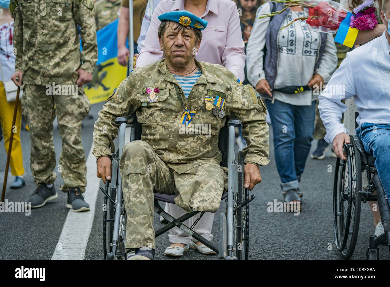 Donbass war veteran in a wheelchair during the celebrations of the ...