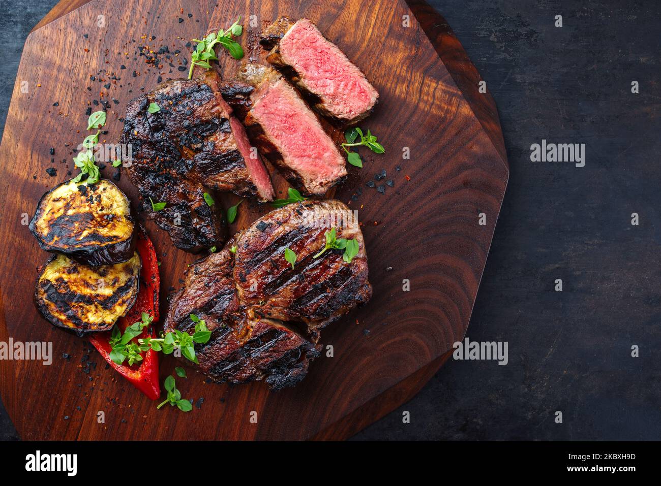 Barbecue dry aged angus rib-eye beef steak with grilled vegetable and ...