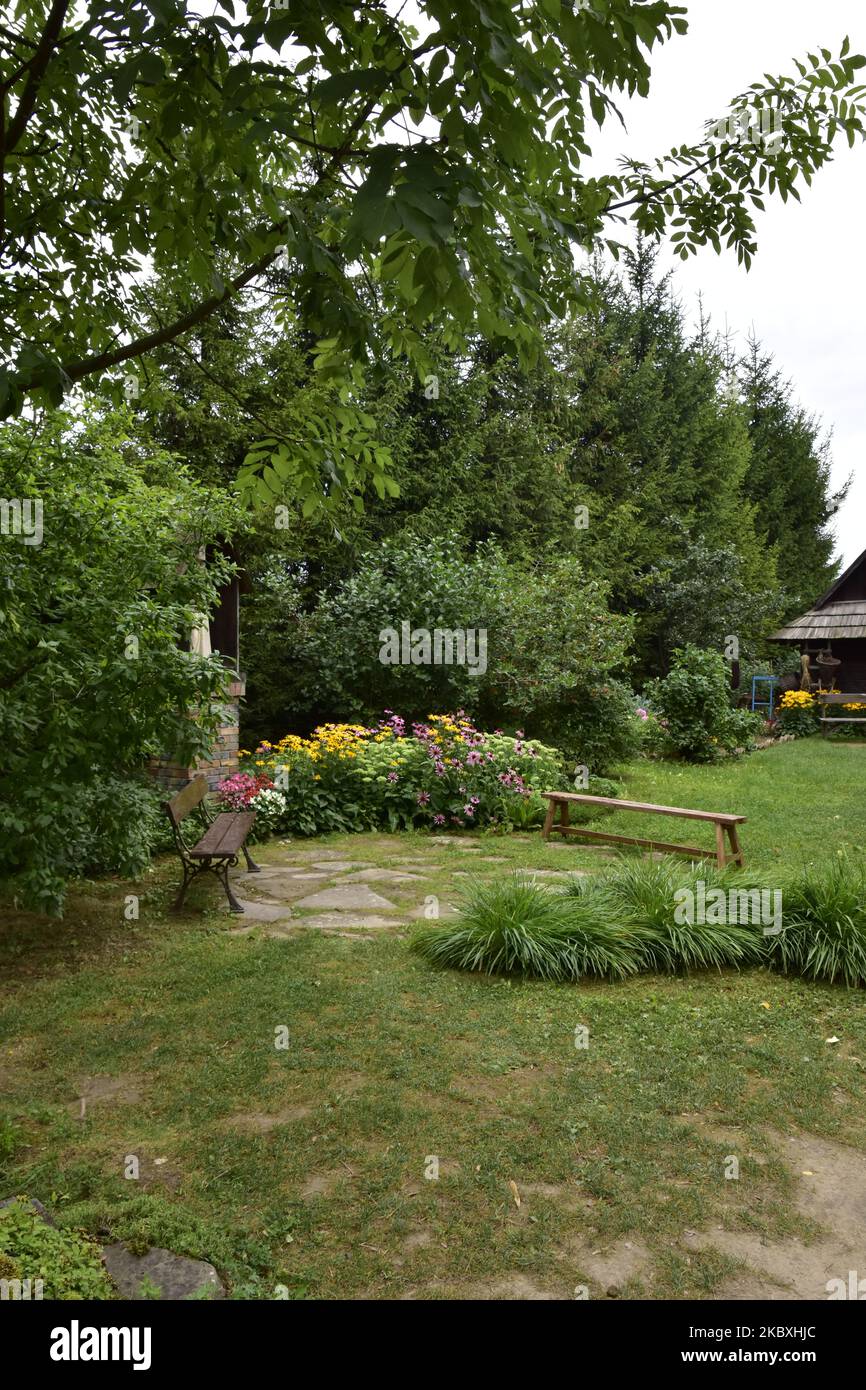 An old classic European wooden house complete with a yard, a classic ...