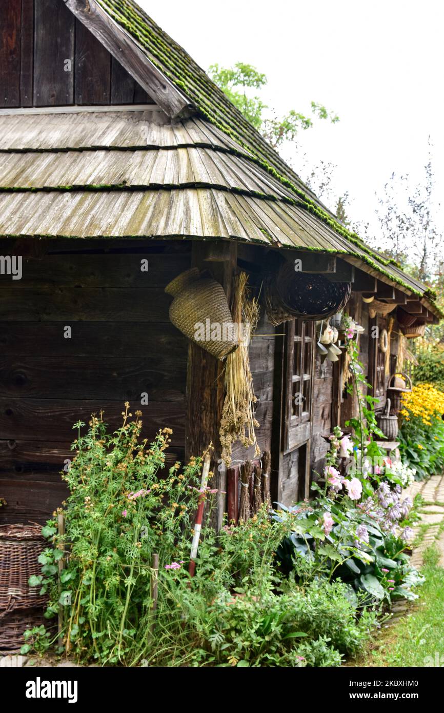 An old classic European wooden house complete with a yard, a classic ...