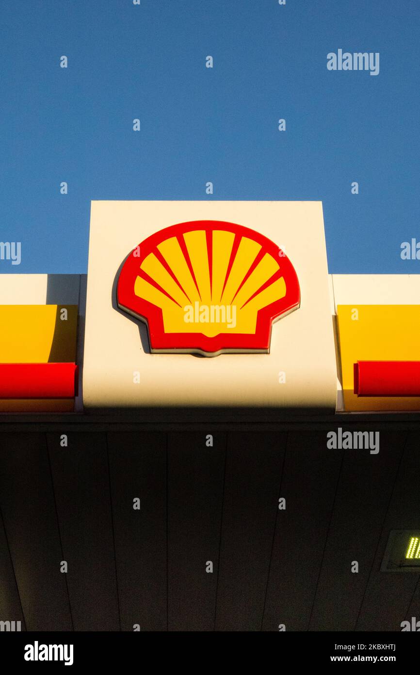 The Shell logo on branding on a petrol station forecourt in England, UK ...