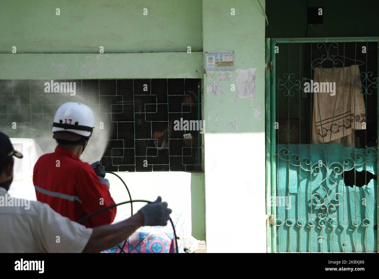 Volunteer of humanitarian organization of Lingkaran Peduli, wearing ...