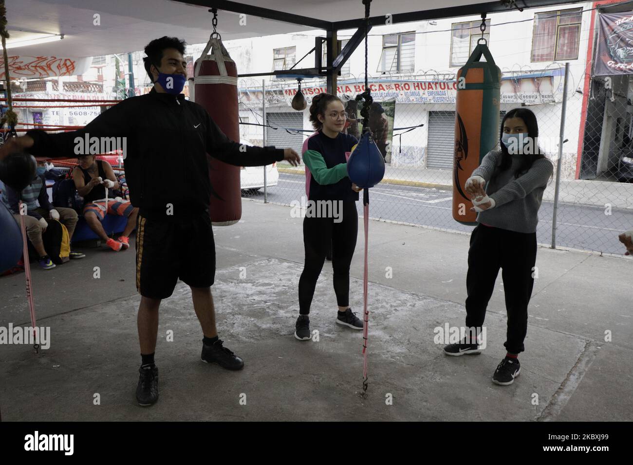 Warm-up prior to boxing classes at the Team Curtidores Boxing Technical ...