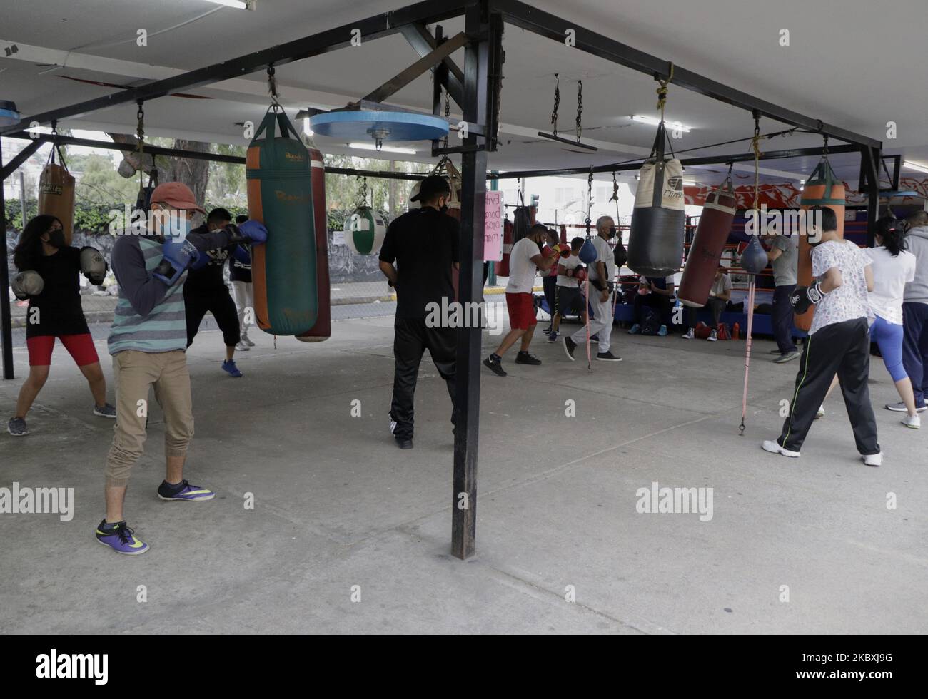 Boxing classes at the Team Curtidores Boxing Technical School, which ...