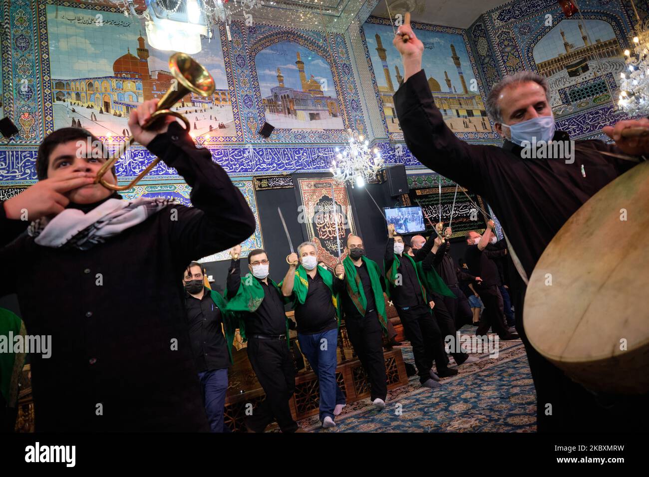 Iraqi immigration men living in Tehran wearing protective face masks ...