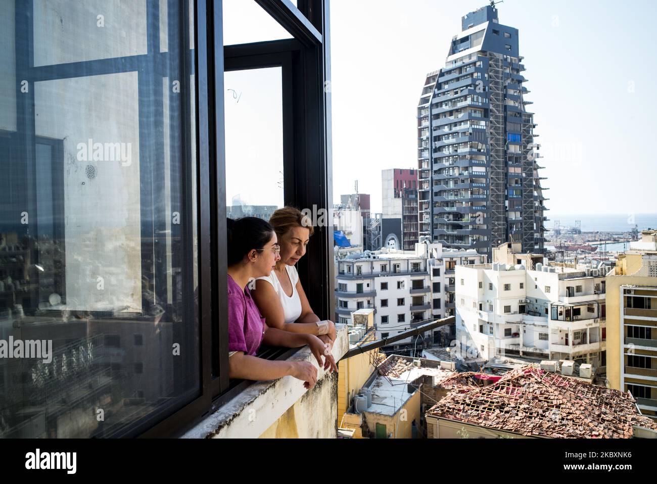 Two Lebanese woman gazing ftom the window upon Geitawi,one of the ...