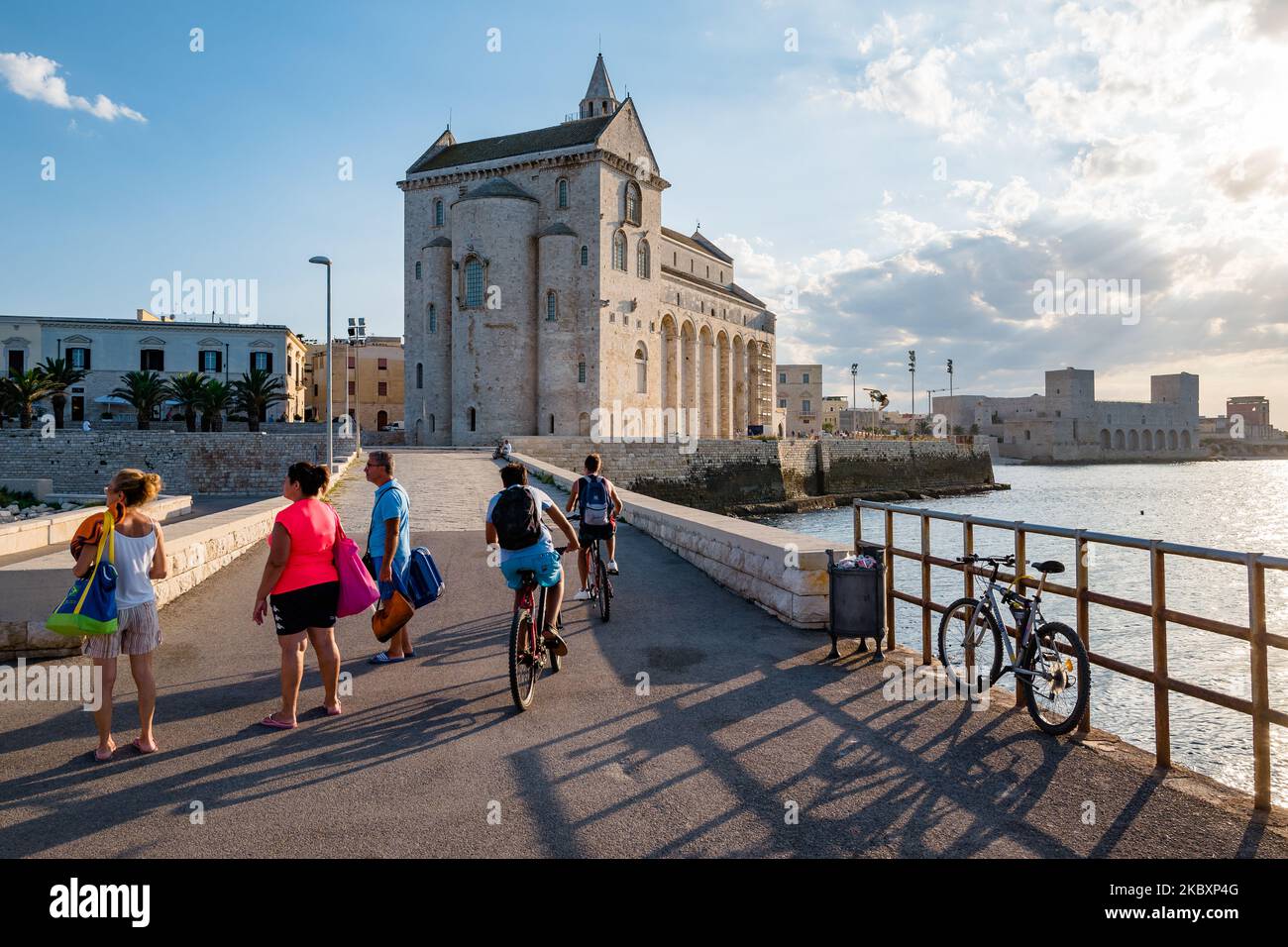 People leaving the sea from the public beach in front of the Cathedral ...
