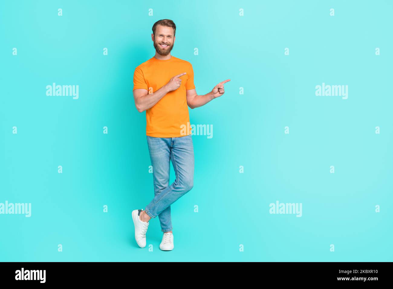 Full Size Photo Of Nice Beard Guy Index Empty Space Wear Orange T Shirt