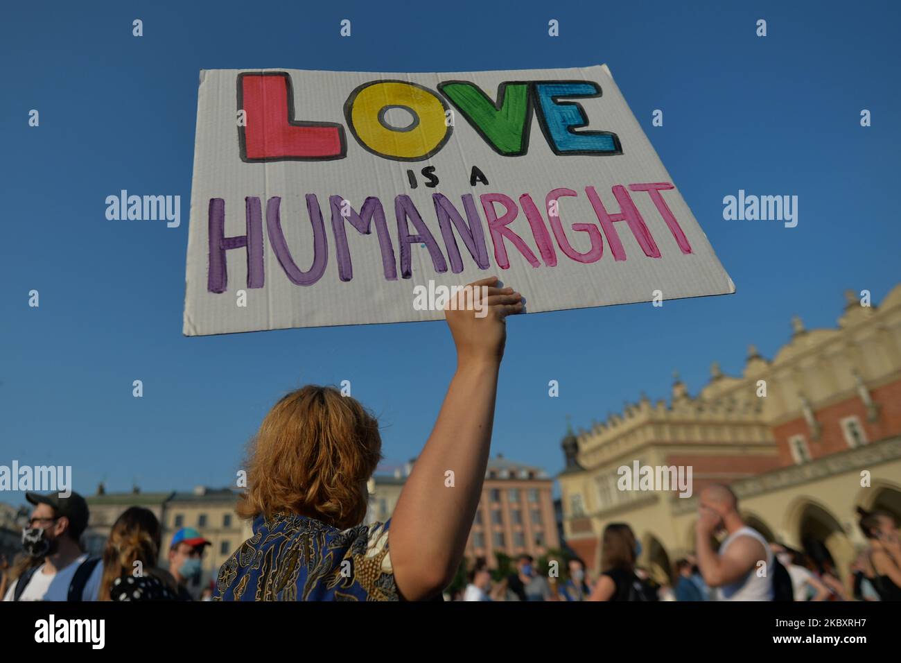 A Pro-LGBT activist holds 'Love Is A Human Right' placard during the ...