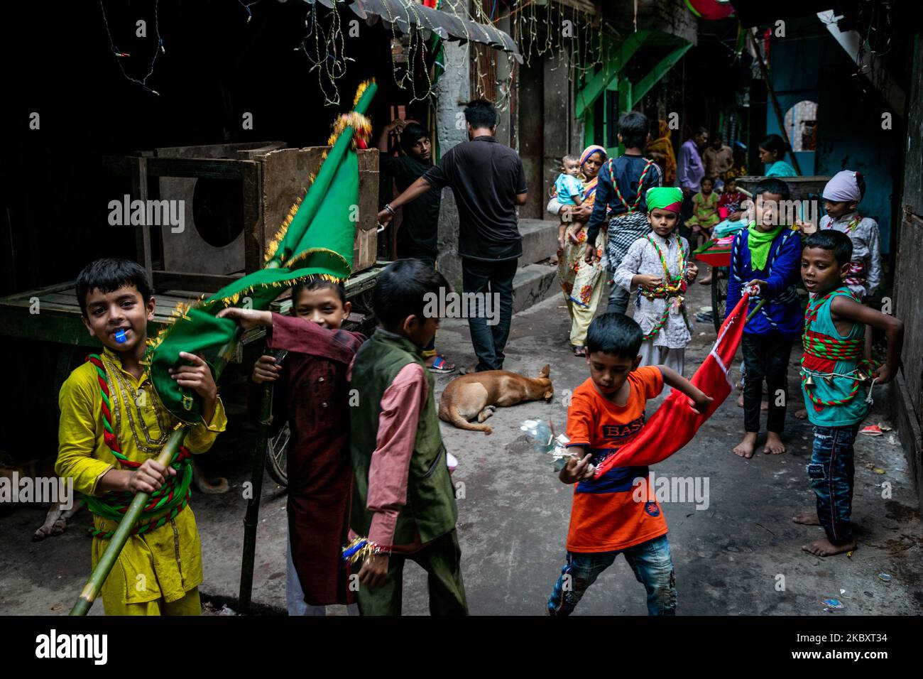 Young Biharis carry flying banners and play with them inside the geneva ...