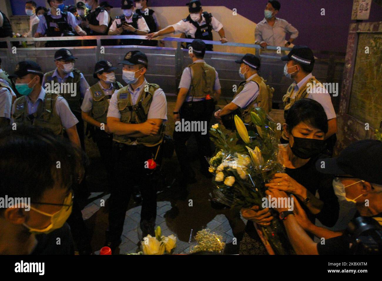 Pro-democracy Legislative Council member Claudia Mo holds flowers at ...