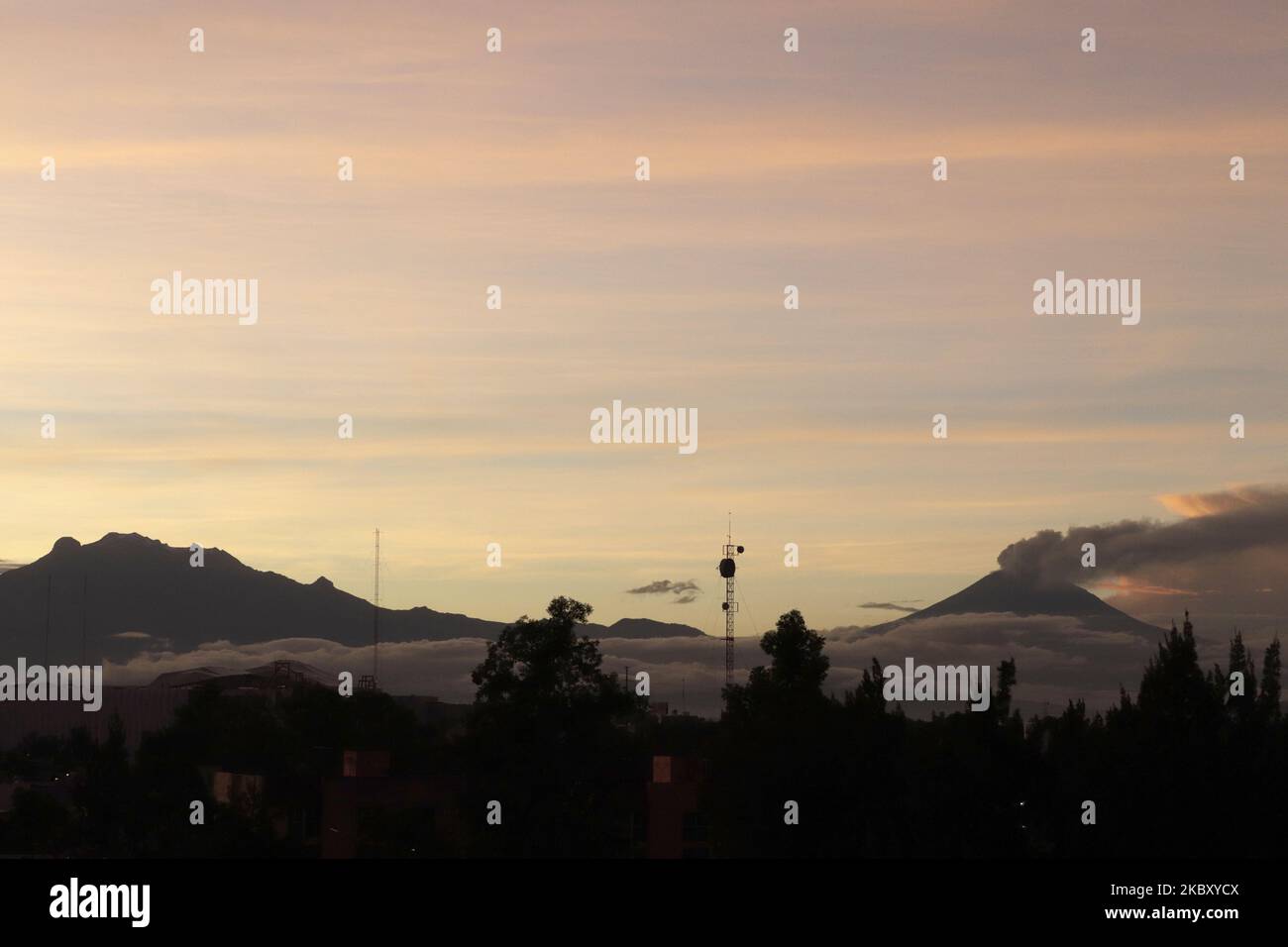 The Popocatepetl Volcano spews ash and smoke as seen from Mexico City ...