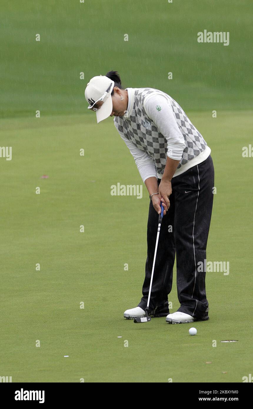 Se Ri Pak of South Korea putts on the 18th hole during round two of ...
