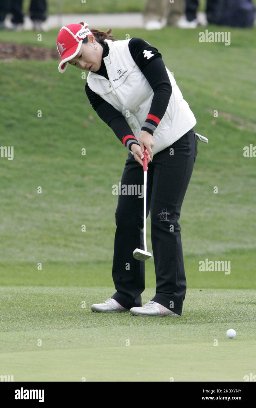 Nov 1, 2009-Incheon, South Korea-Ran Hong of South Korea putts on the ...