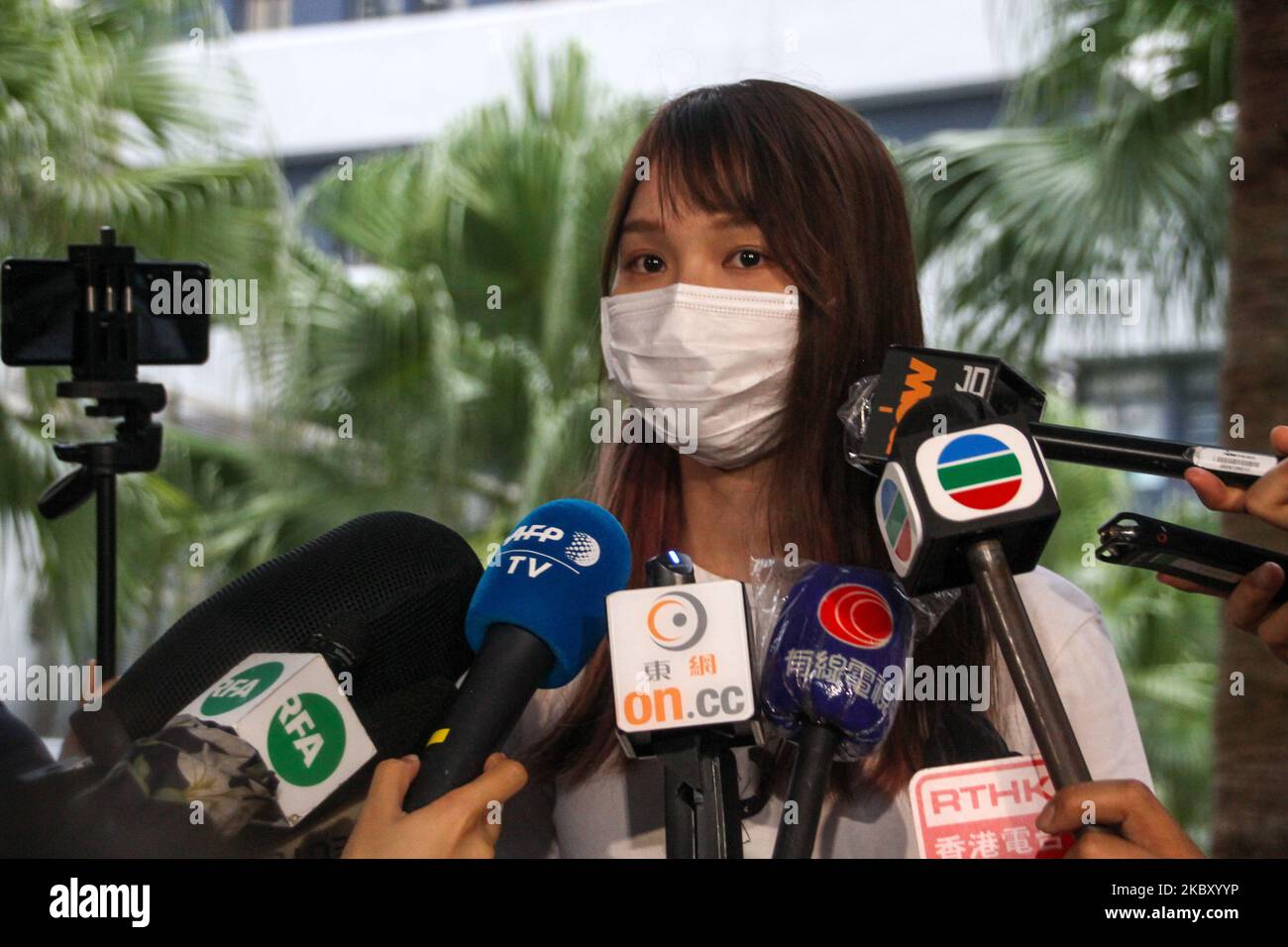 Agnes Chow addresses reporters after attending Tai Po Police Station ...