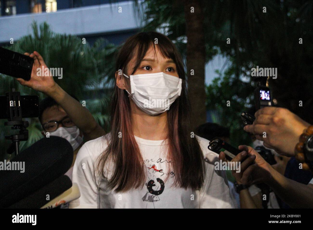 Agnes Chow addresses reporters after attending Tai Po Police Station ...