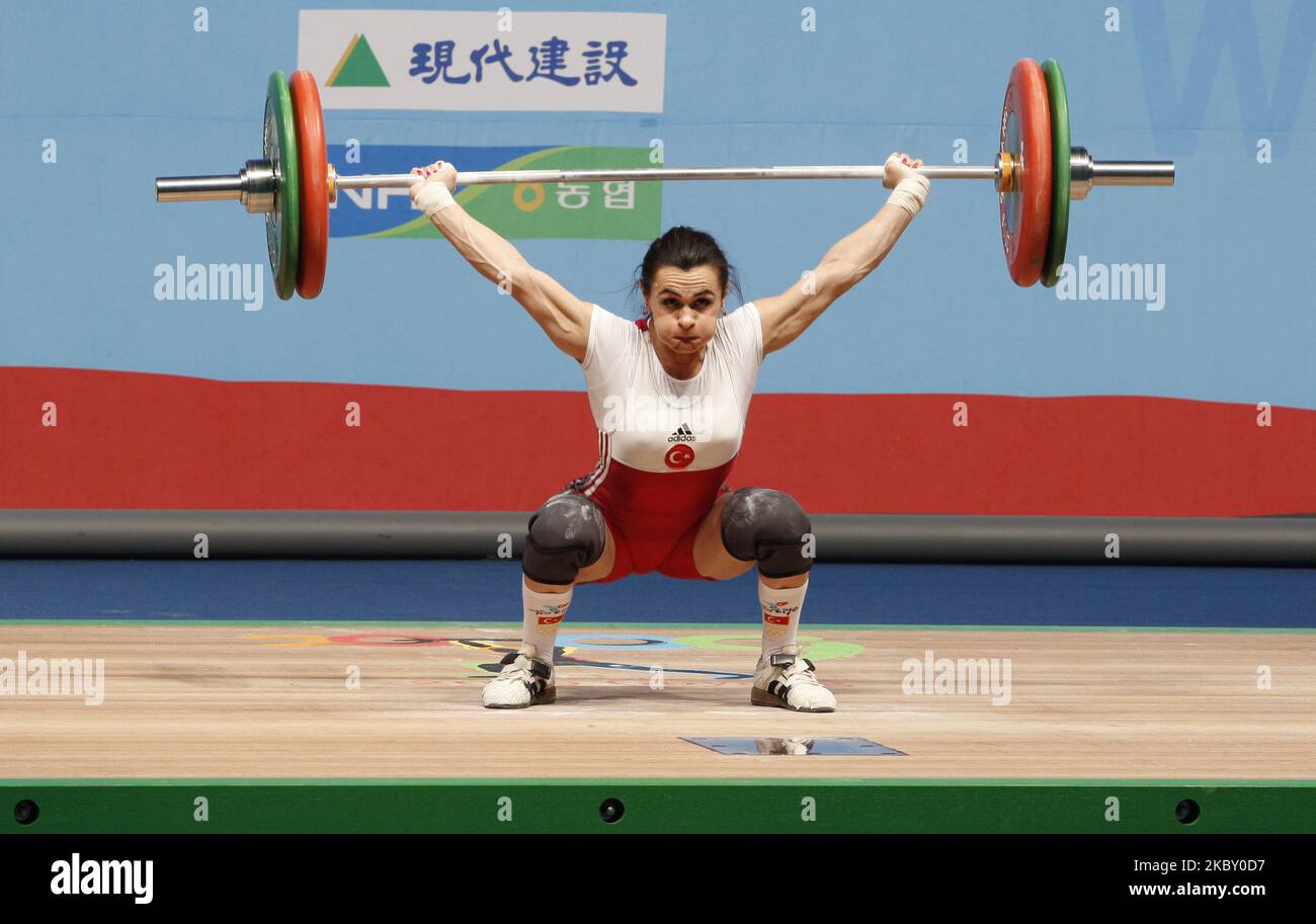 Nurcan Taylan of Turkey competes in the women's 48kg Group A snatch ...