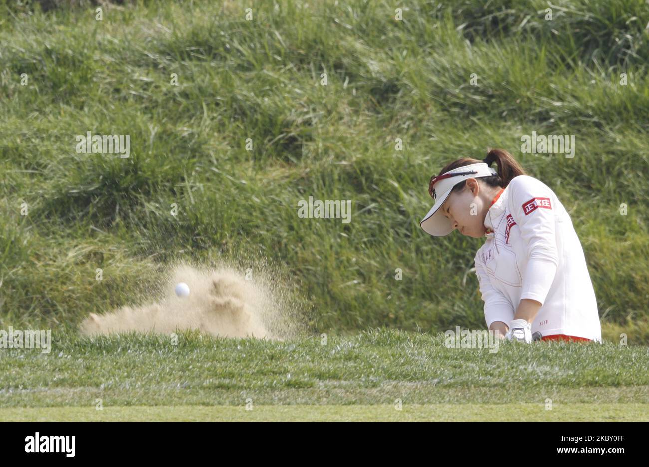 YOON, Seul-A of South Korea, hits from a bunker on the 2th hole during ...
