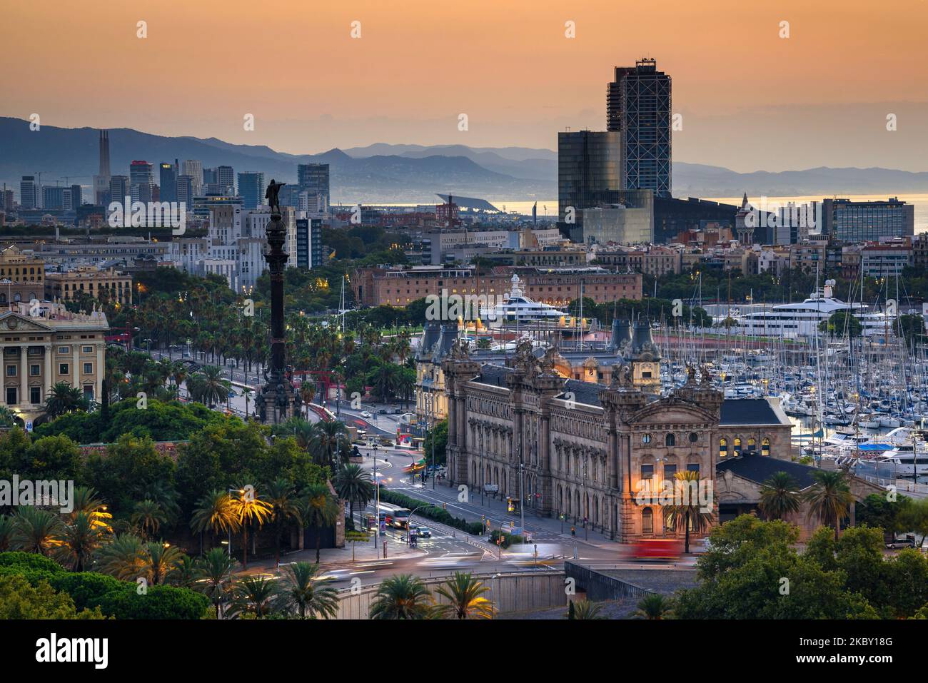 Columbus Monument and Port Vell (Old Harbor) of Barcelona at sunrise ...