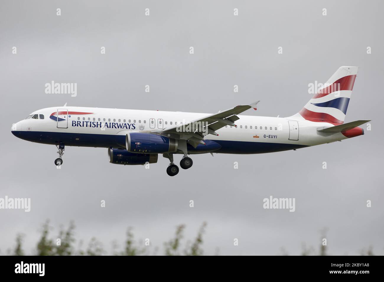 A British Airways Airbus A320 lands at Newcastle Airport, England on ...