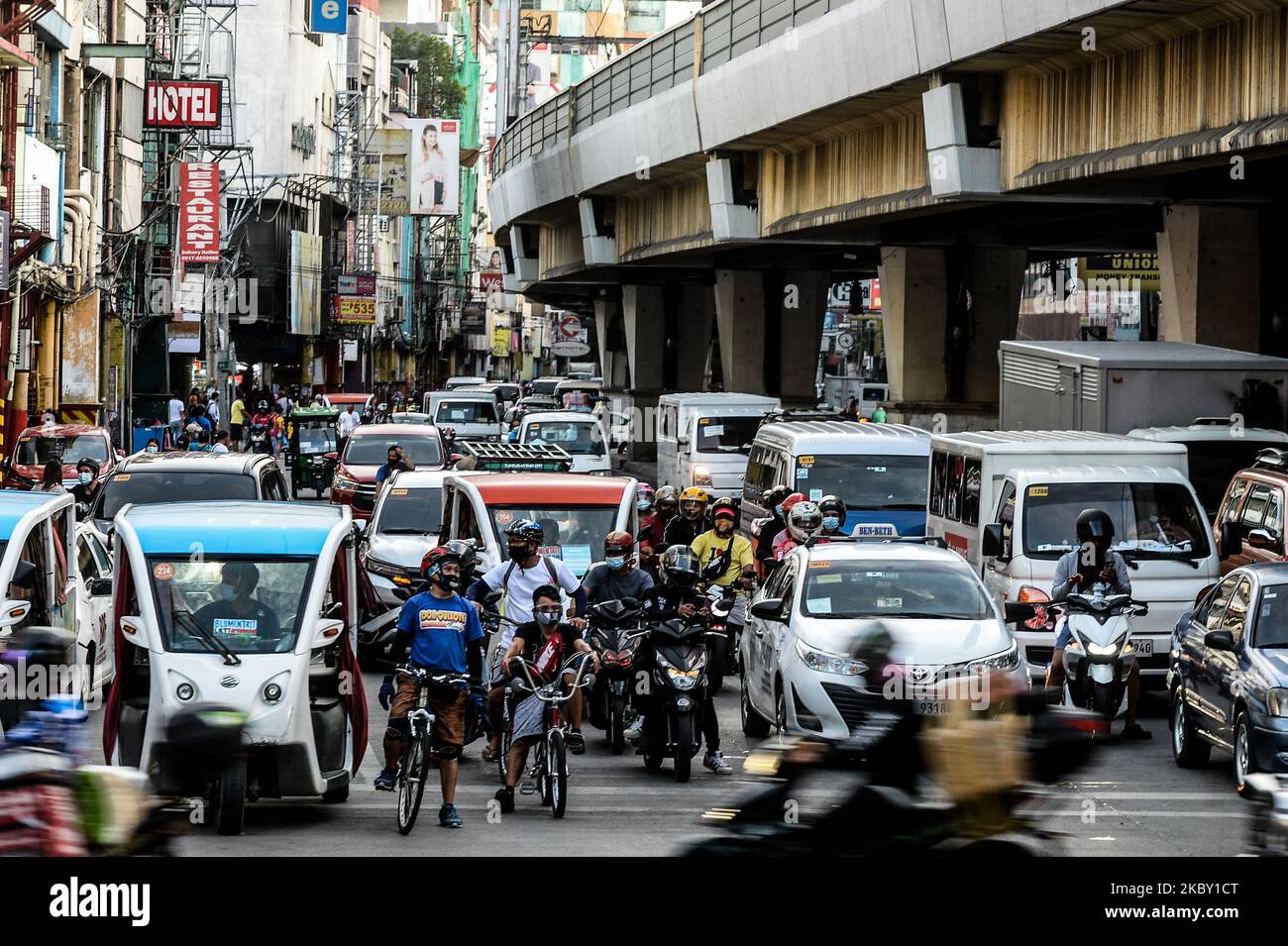 Heavy traffic builds up at an intersection in Manila, Philippines on ...
