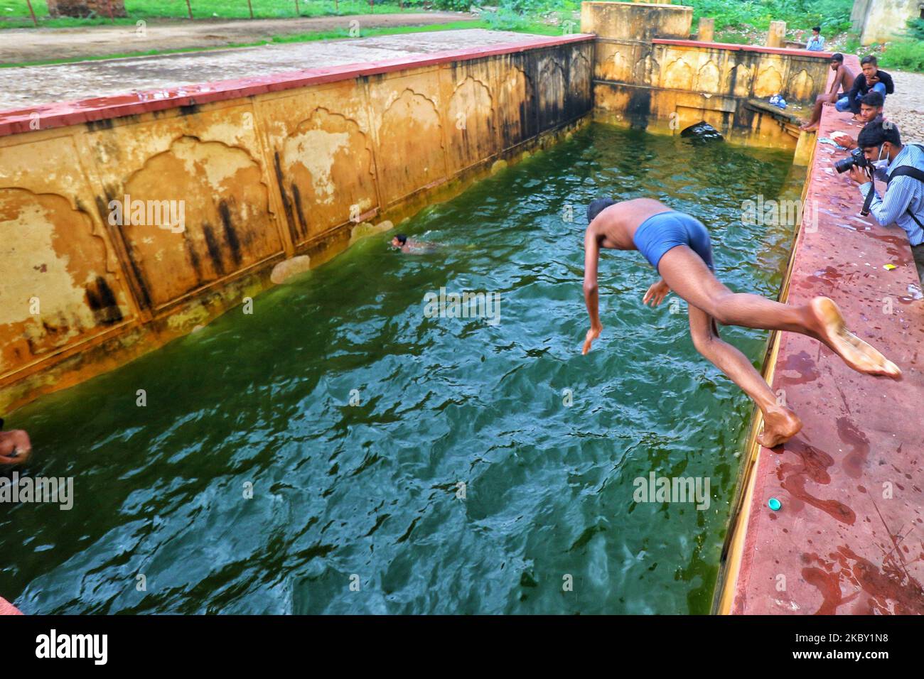 Children jump lake hi-res stock photography and images - Alamy