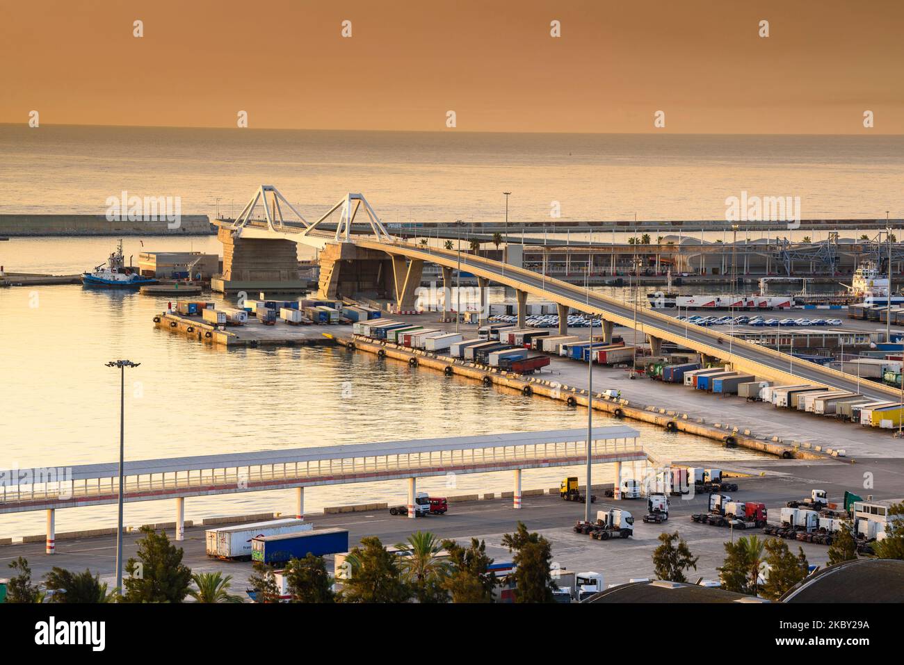 Port of Barcelona, Europe gate bridge and a cruise terminal at dawn ...