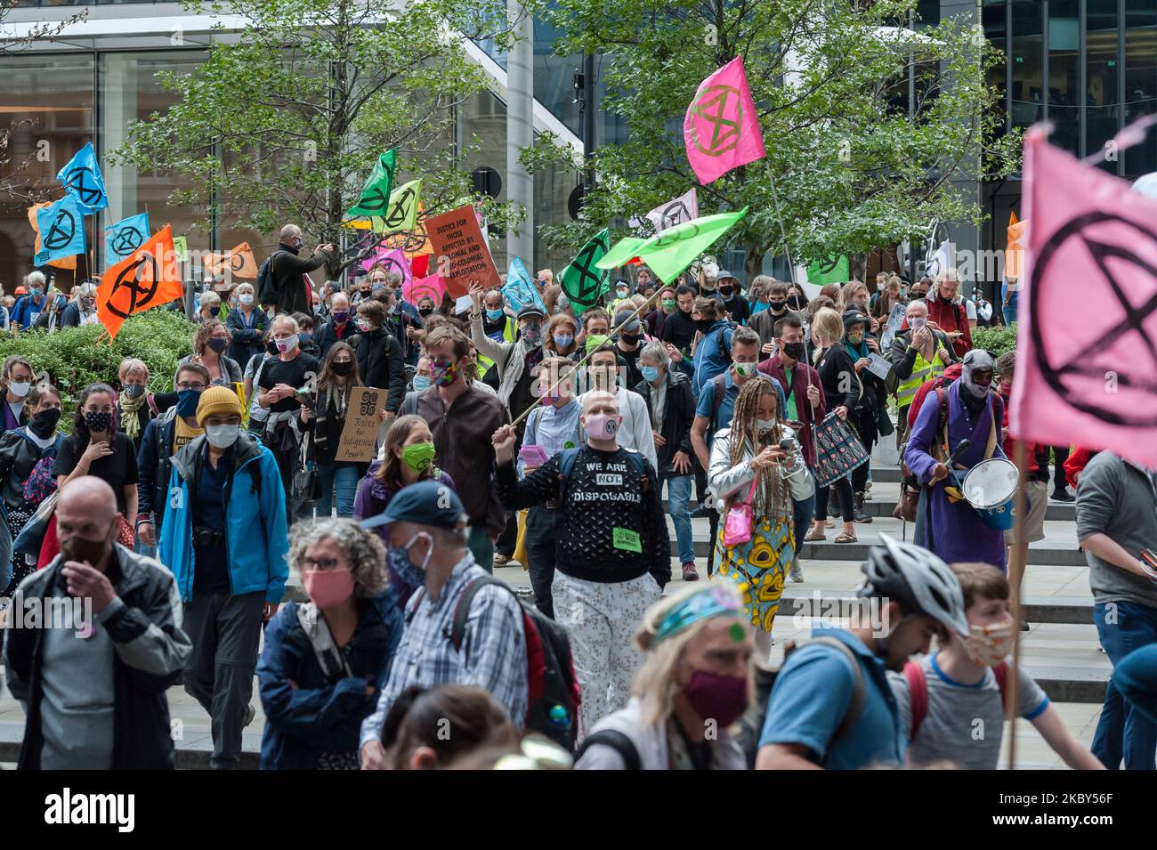 Extinction Rebellion environmental activists stop outside headquarters ...