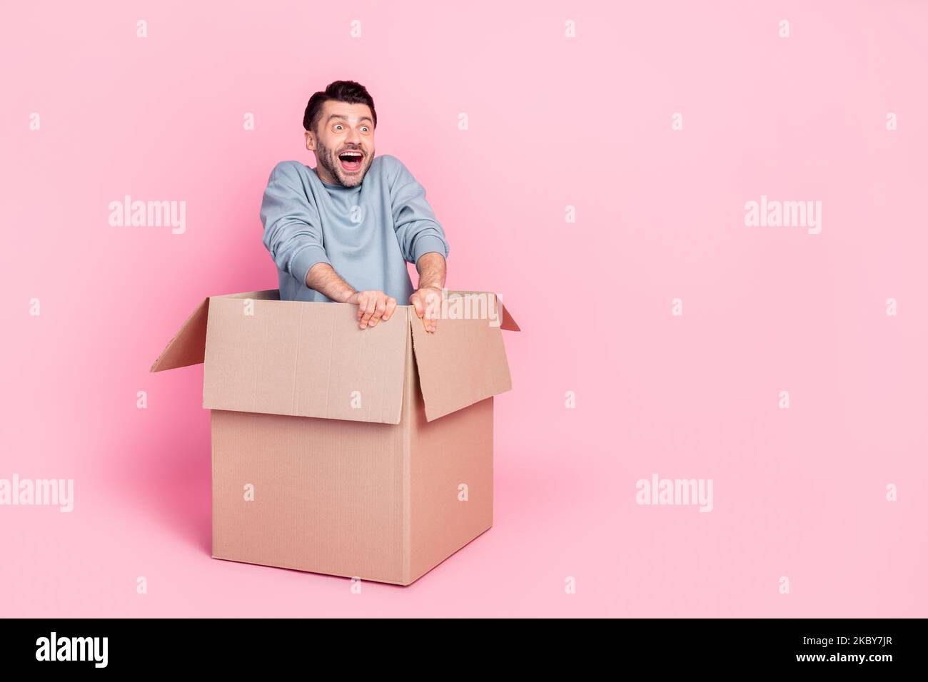 Full body photo of nice young guy excited sit box ready relocate post ...