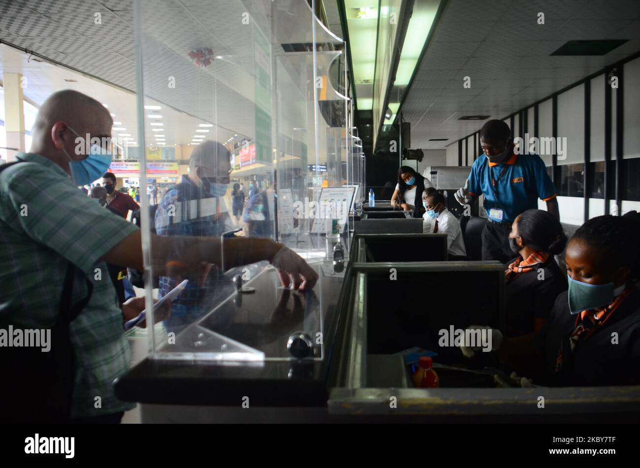 Flight attendants attending to passengers at Murtala Muhammed ...