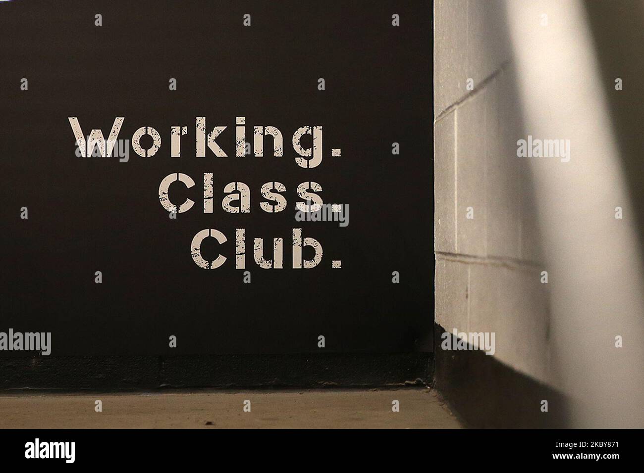 A sign reading Working Class Club located within a stand inside the ...