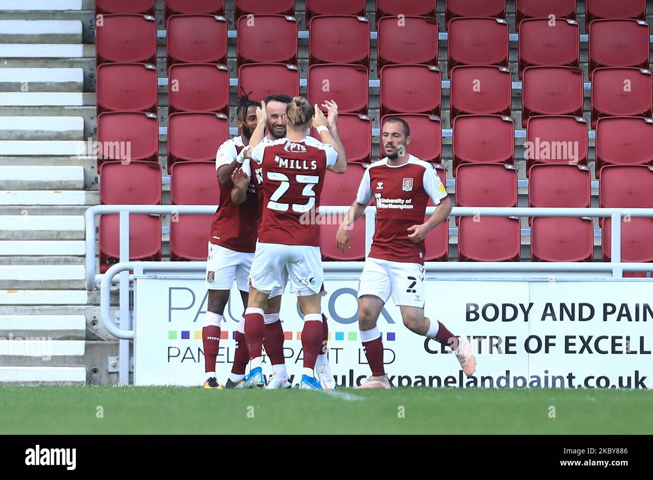 Matt Warburton of Northampton Town scores his sides second goal during ...