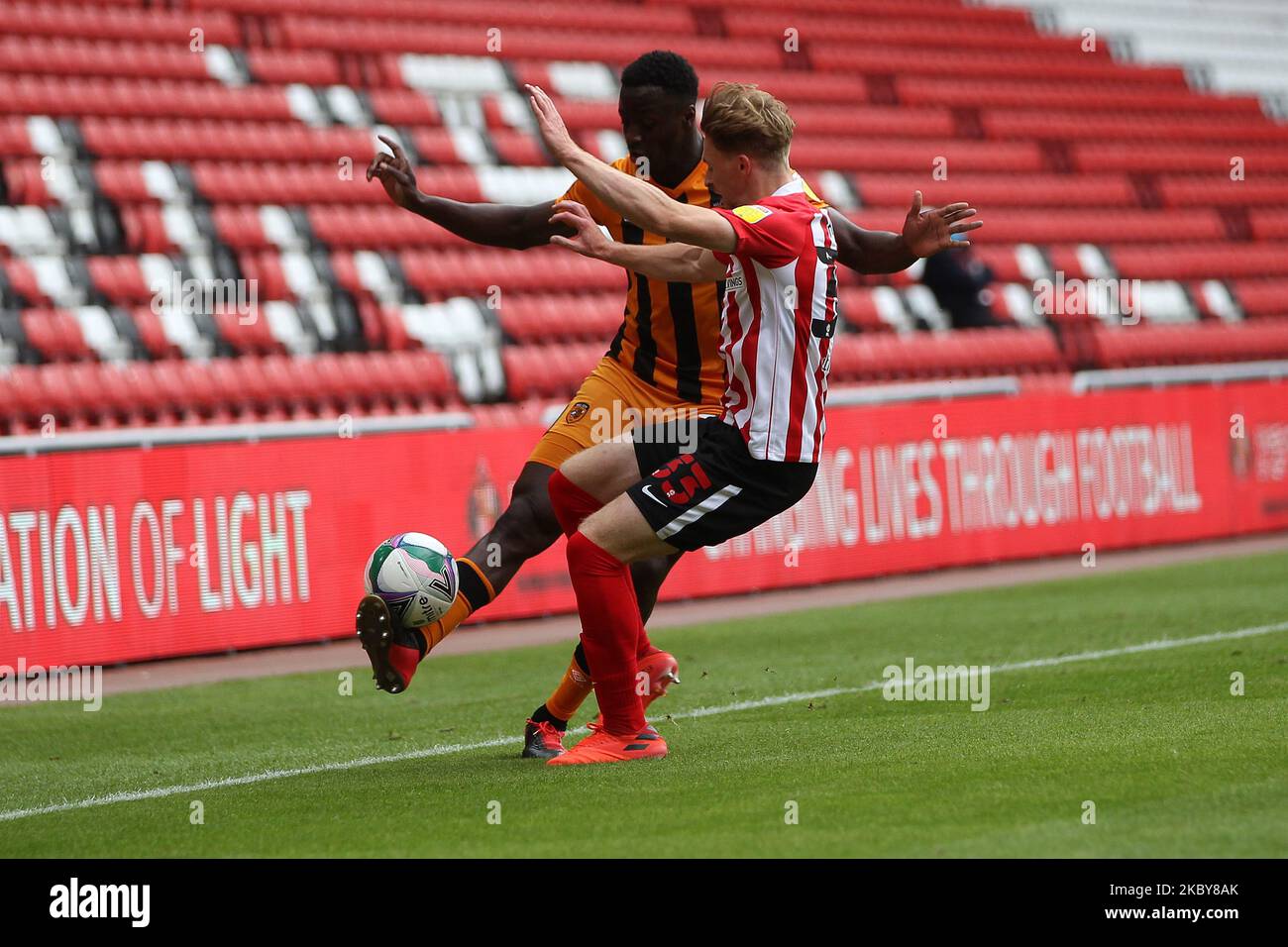 Josh Emmanuel of Hull City in action with Sunderland's Denver Hume ...
