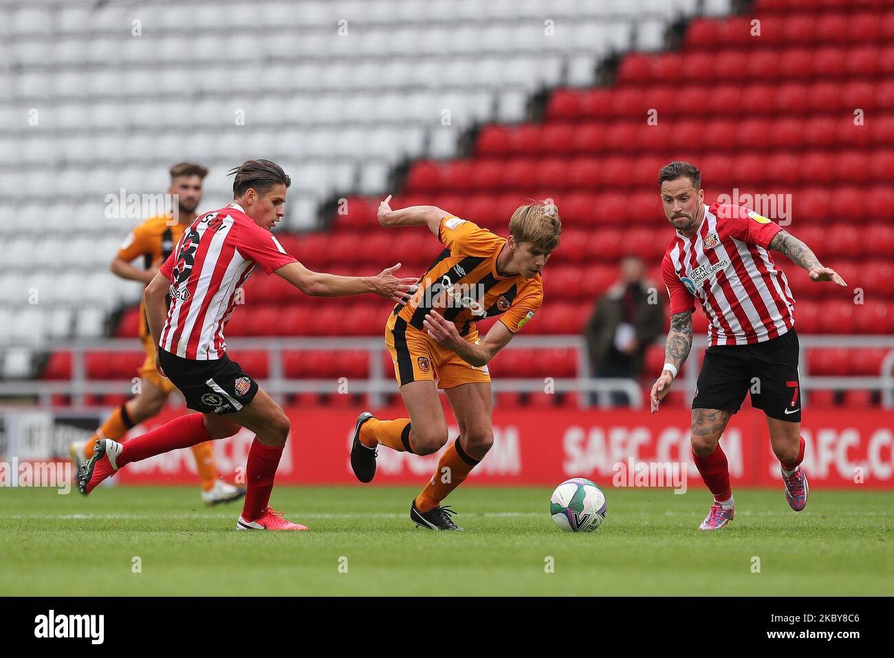 Martin Samuelsen of Hull City battles for possession with George Dobson ...