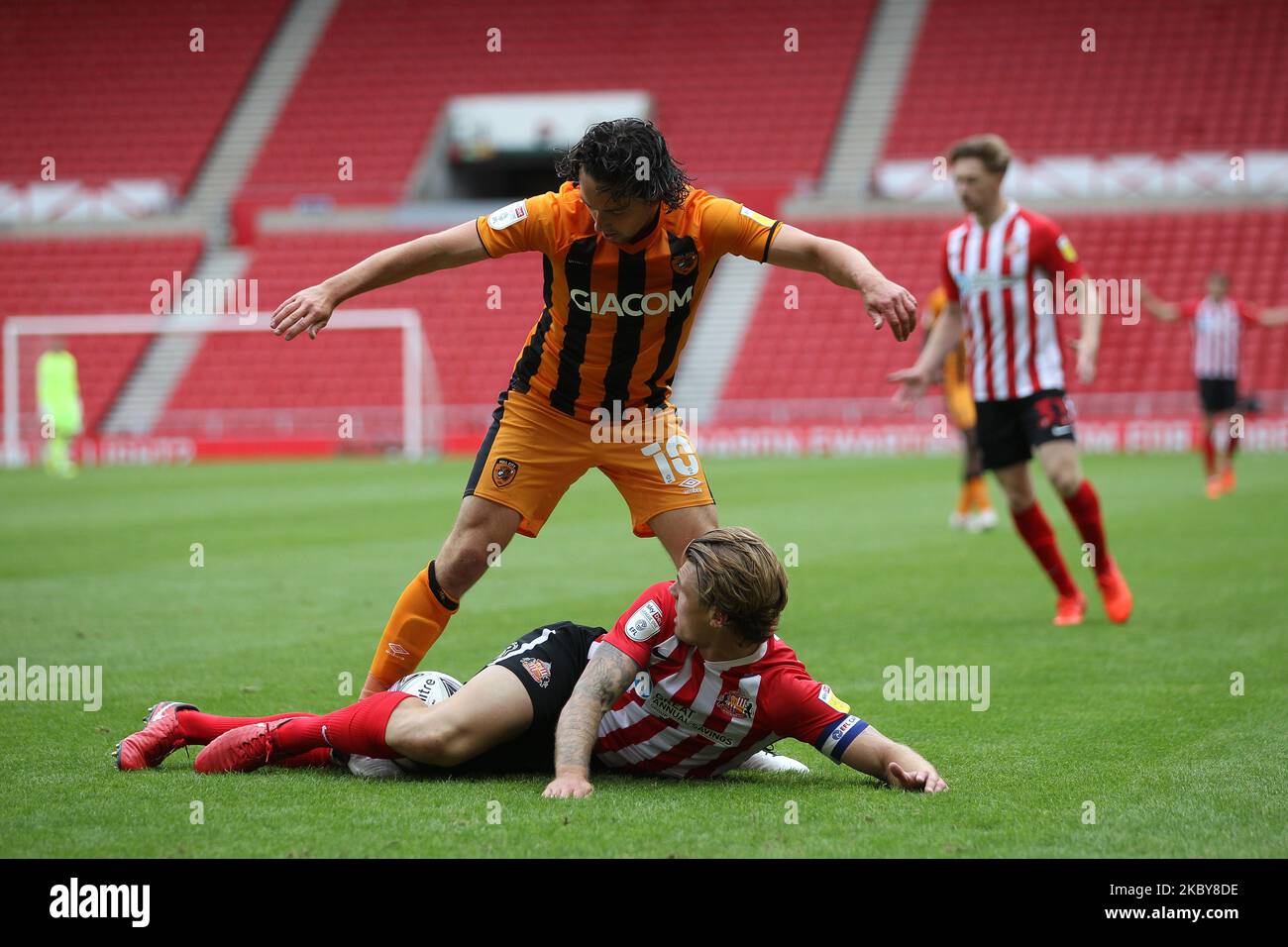 Hull City's George Honeyman in action with Sunderland's Max Power ...