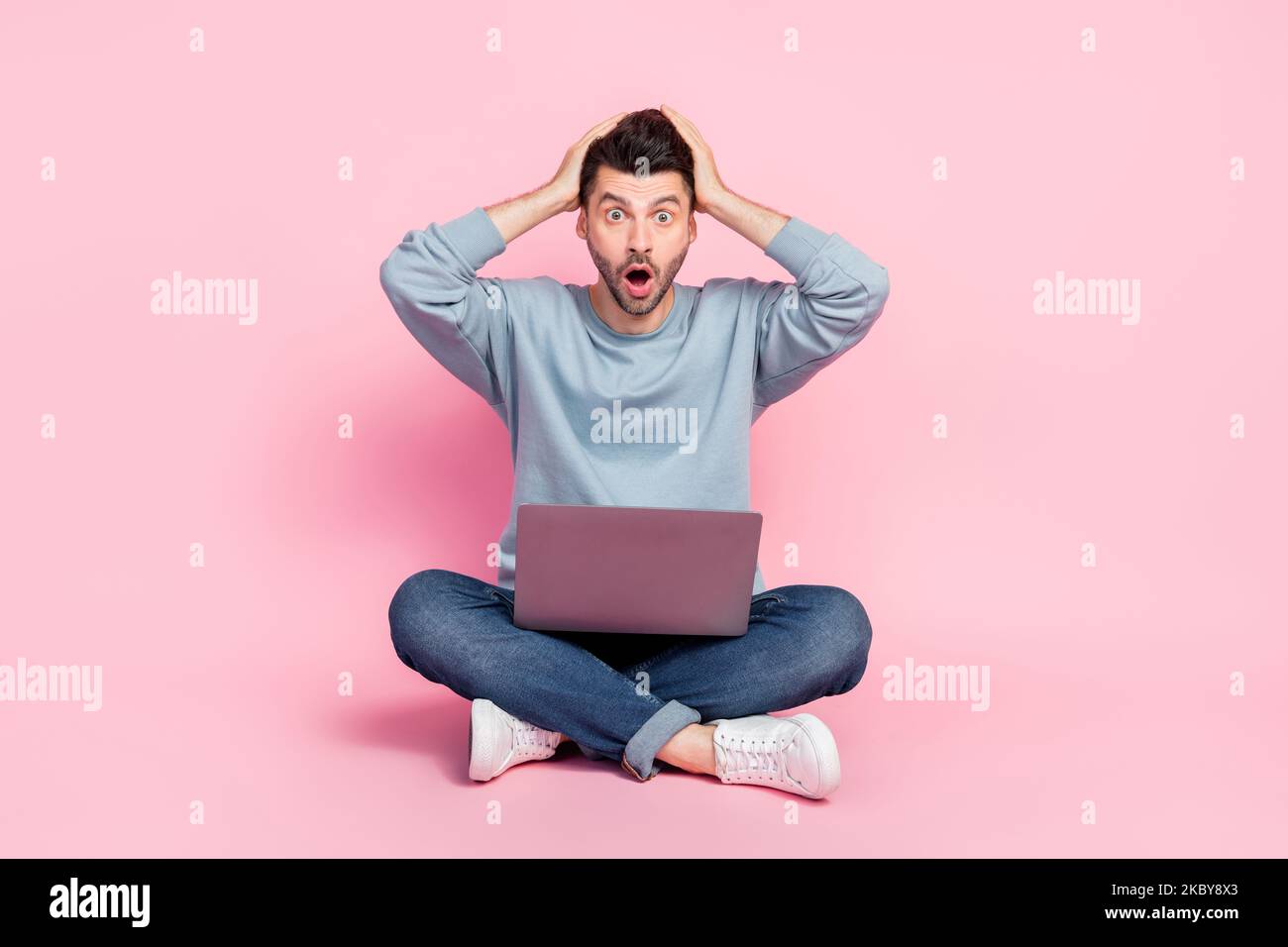 Full size photo of handsome young man touch head terrified broken ...