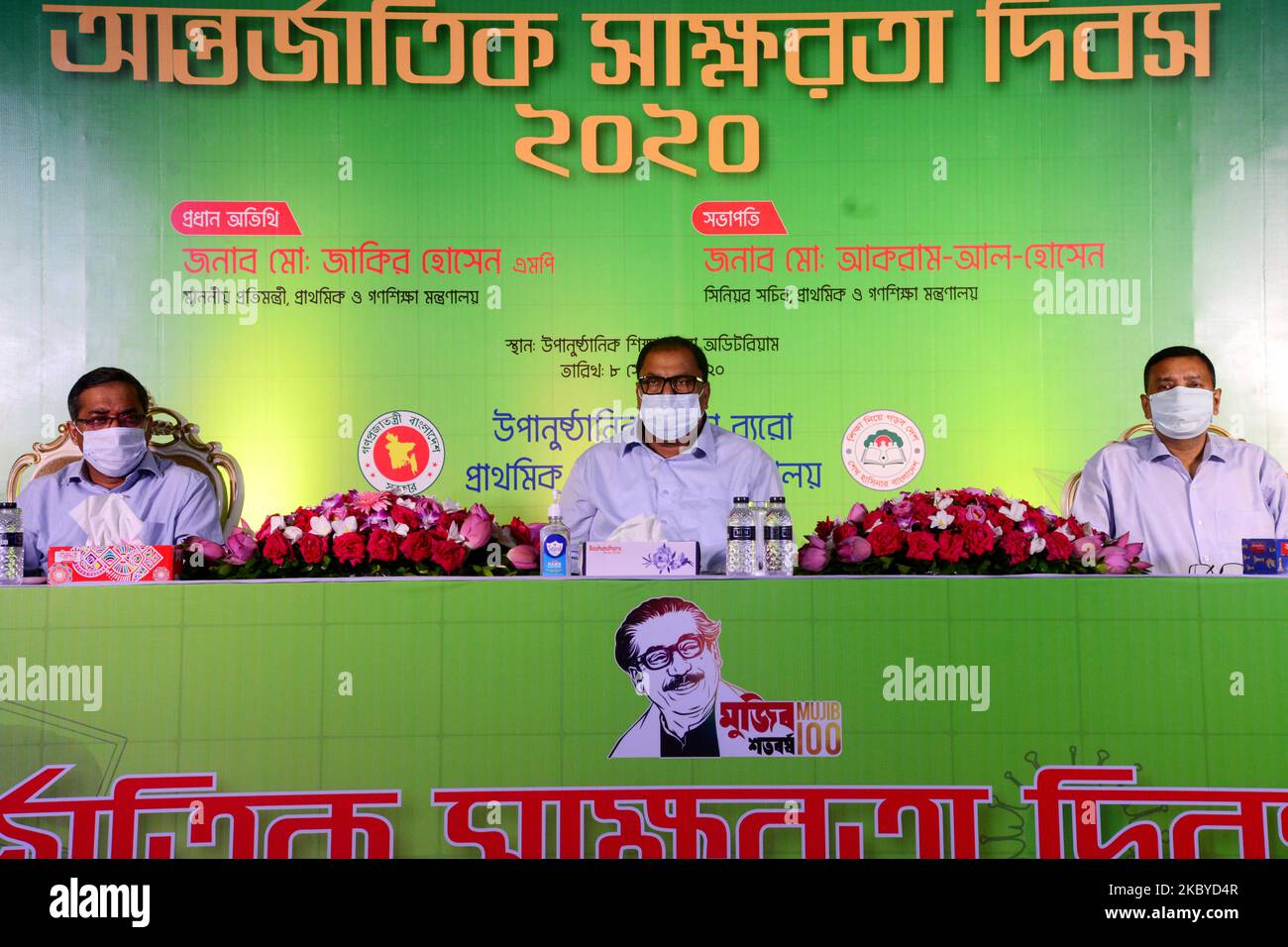 People wearing facemask attends at a seminar to celebrate World ...