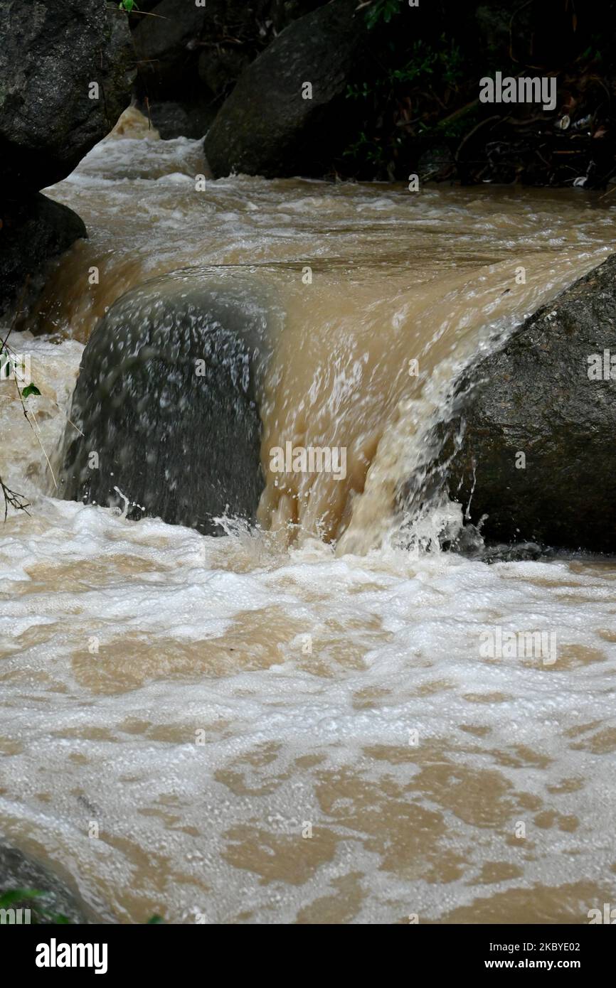 A vertical shot of a small cascade Stock Photo - Alamy