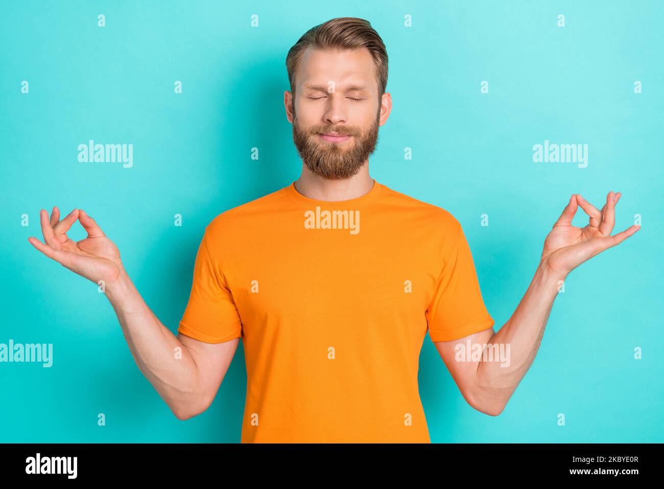 Photo of concentrated meditating good mood man with blond hairstyle ...