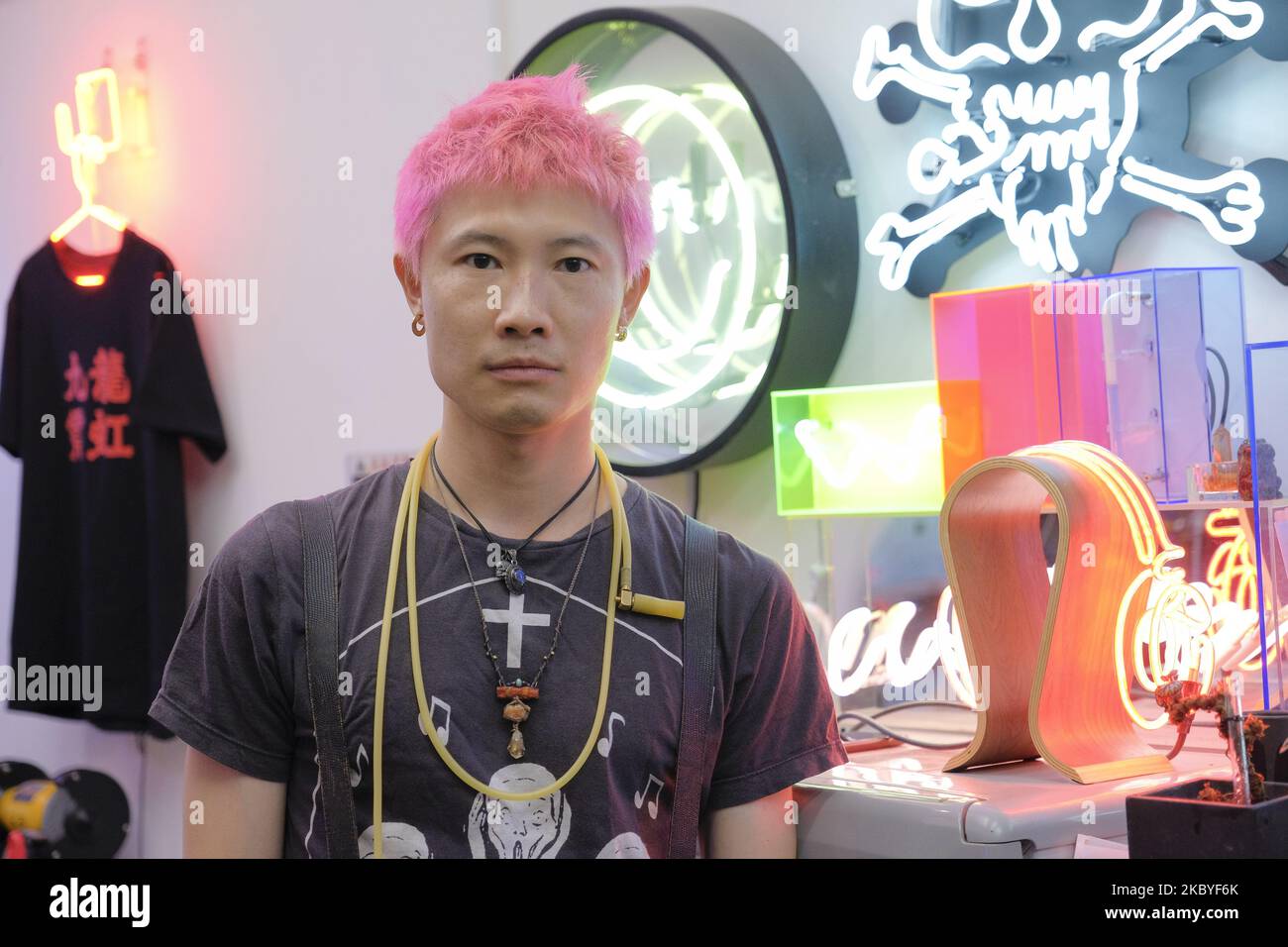 Jive Lau Ho-fai (pink hair) teaches a neon bending workshop to writer ...