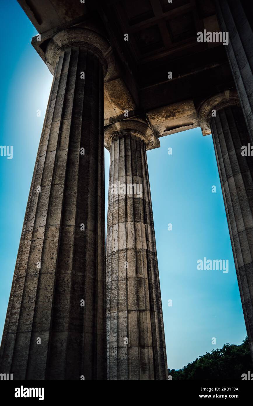 A vertical shot of the three pillars under clear blue sky Stock Photo ...