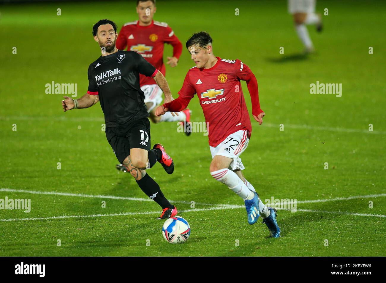 United’s Mark Helm charges forward during the EFL Trophy match between ...