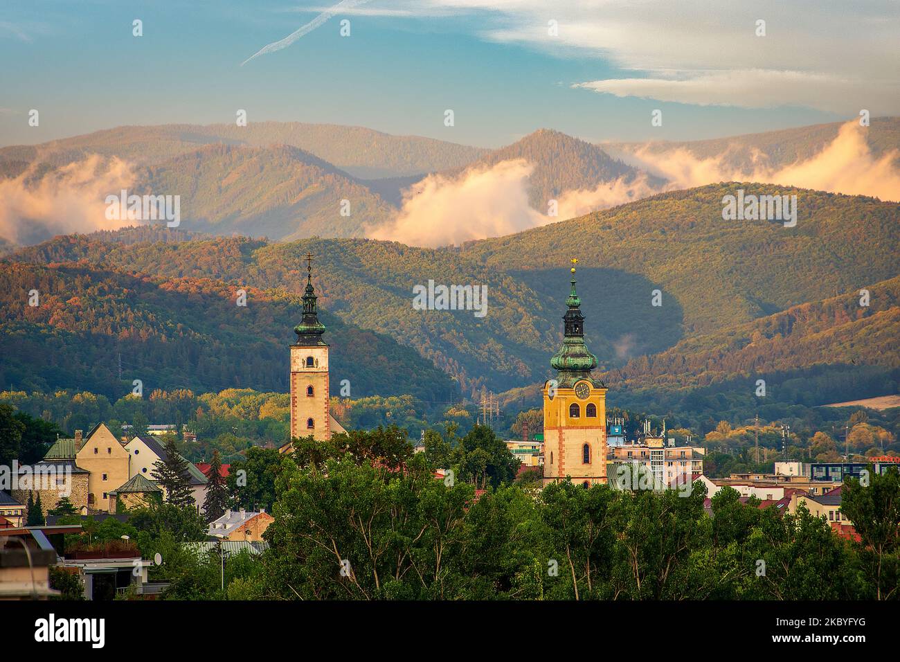 The town of Banska Bystrica surrounded by mountains in central Slovakia ...