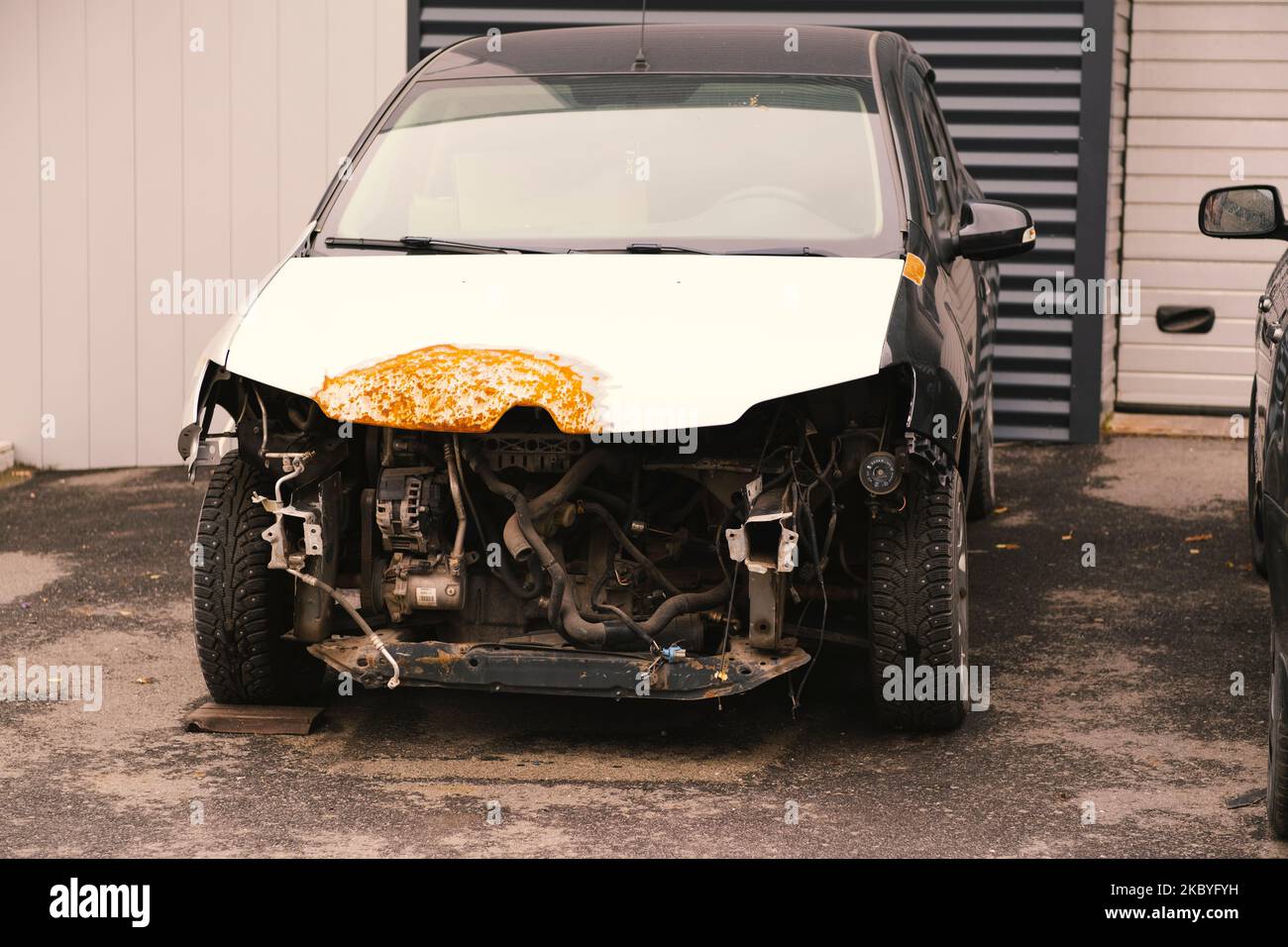The car after the accident. Broken car. The body of the car is damaged ...