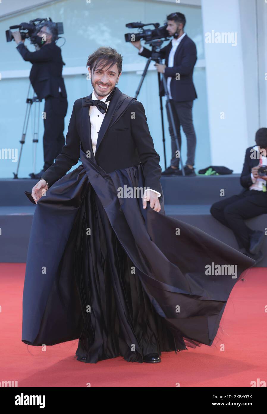 Osvaldo Supino walks the red carpet ahead of the movie ''Le Sorelle ...