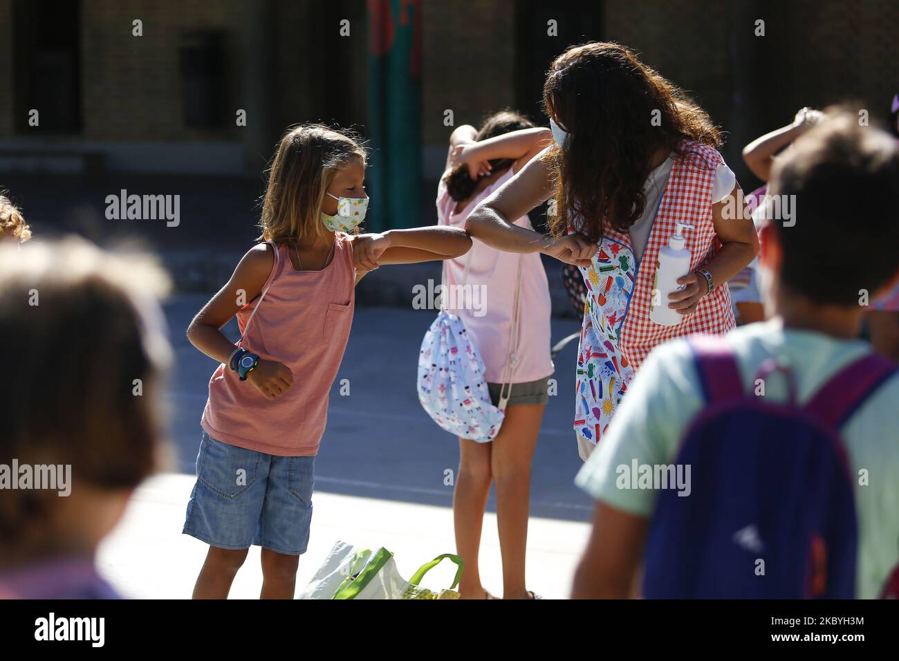 Student bumping elbows hi-res stock photography and images - Alamy