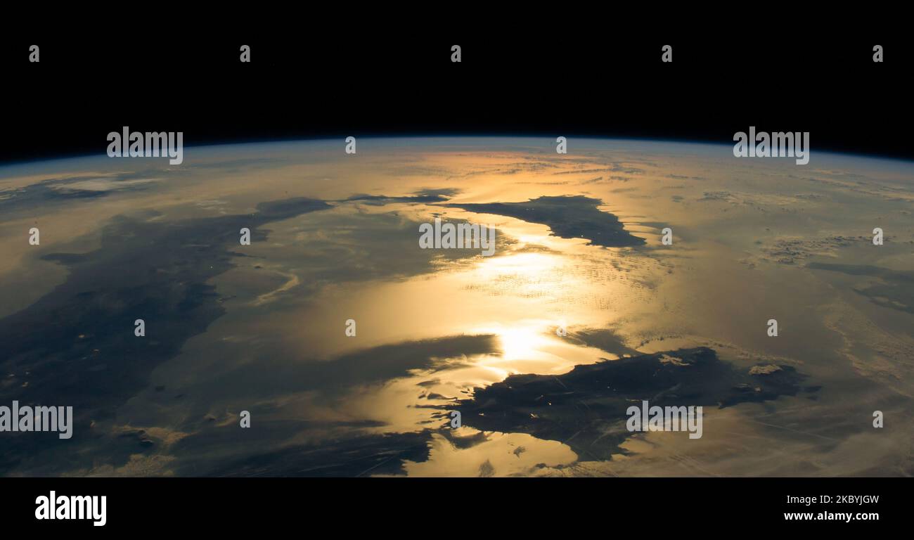 sunrays on the earth surface. Earth from space observation landscape ...